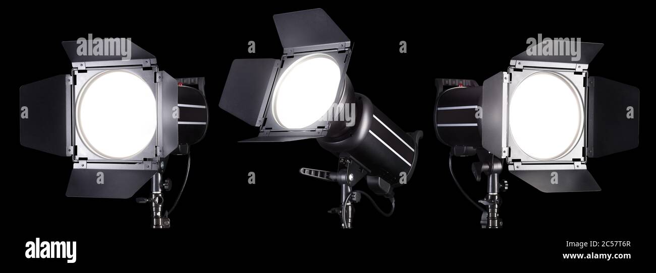Set of photography studio flash isolated on black background with lamp ...