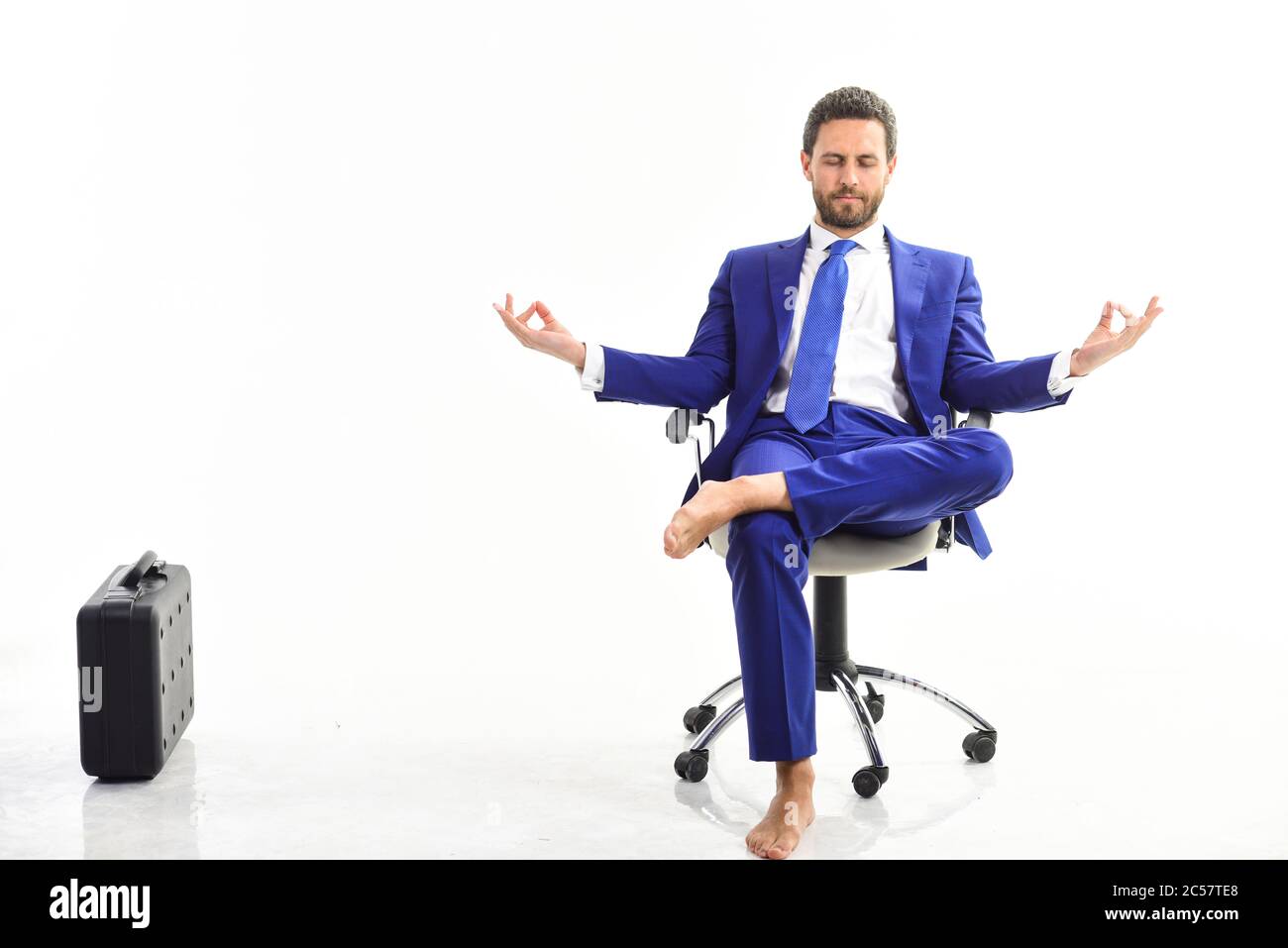 Work and relax concept. Man in suit or businessman sit on office chair ...