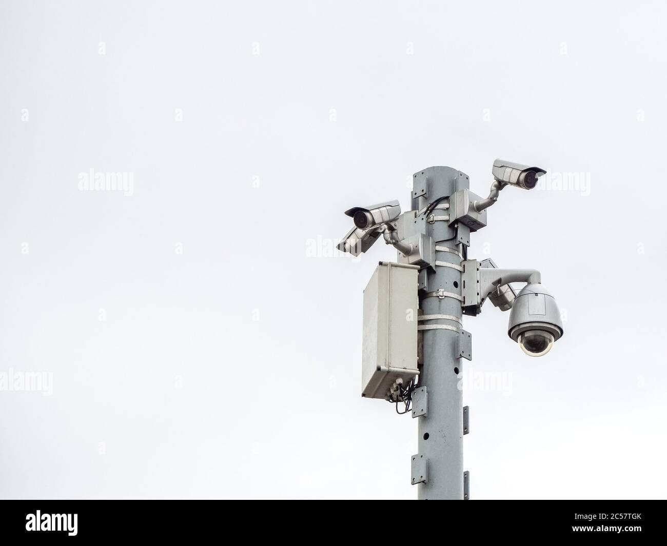 Closeup photo of a column with many surveillance cameras Stock Photo ...