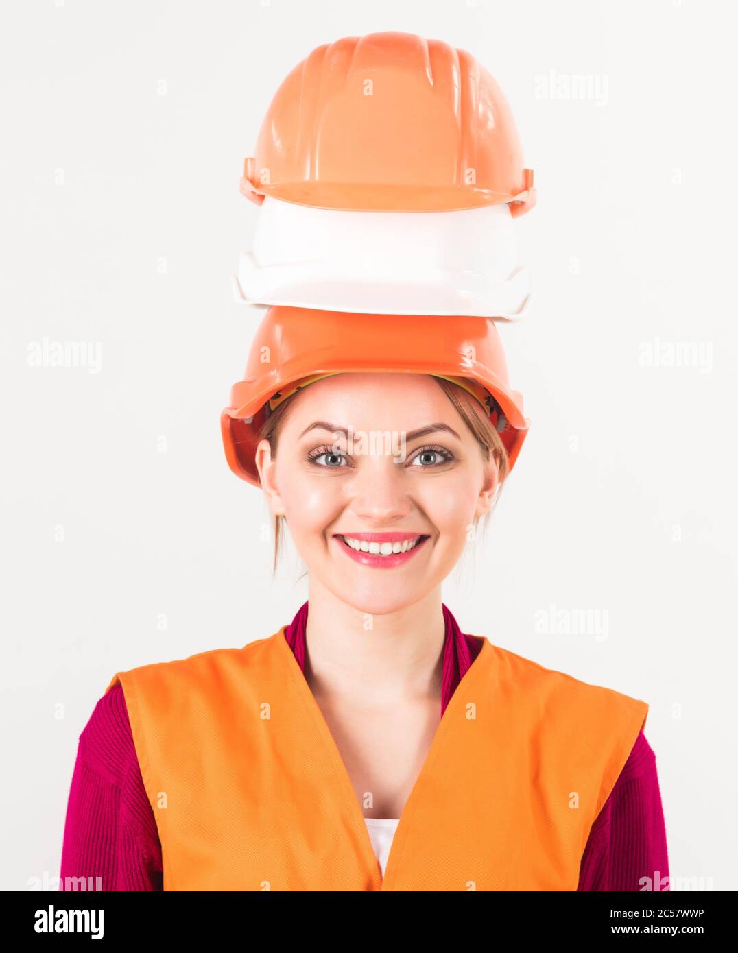 Woman on happy smiling face in builders uniform, white background ...