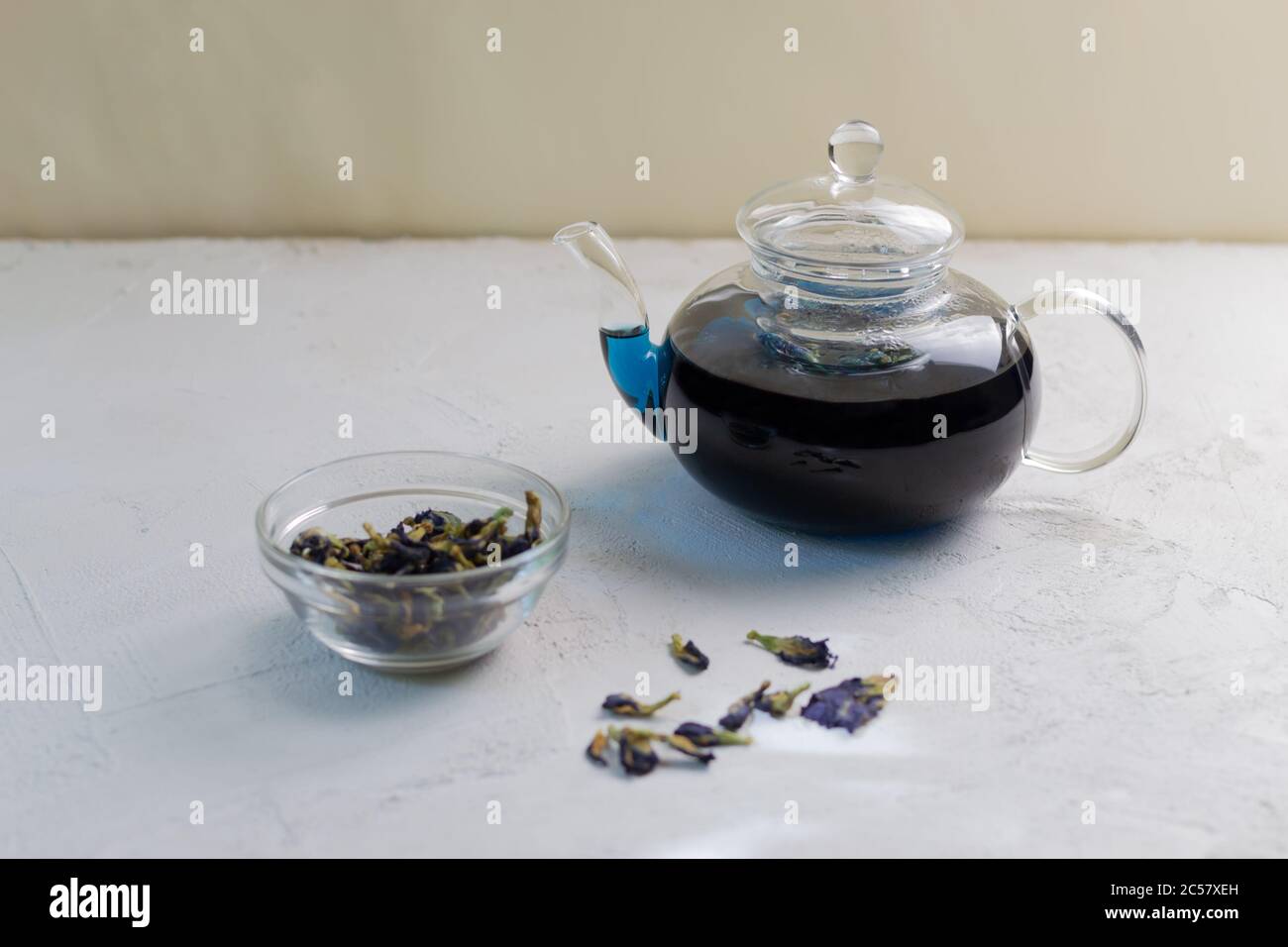 Blue Thai Anchan tea in a glass teapot. Amazing indigo color. Copy ...