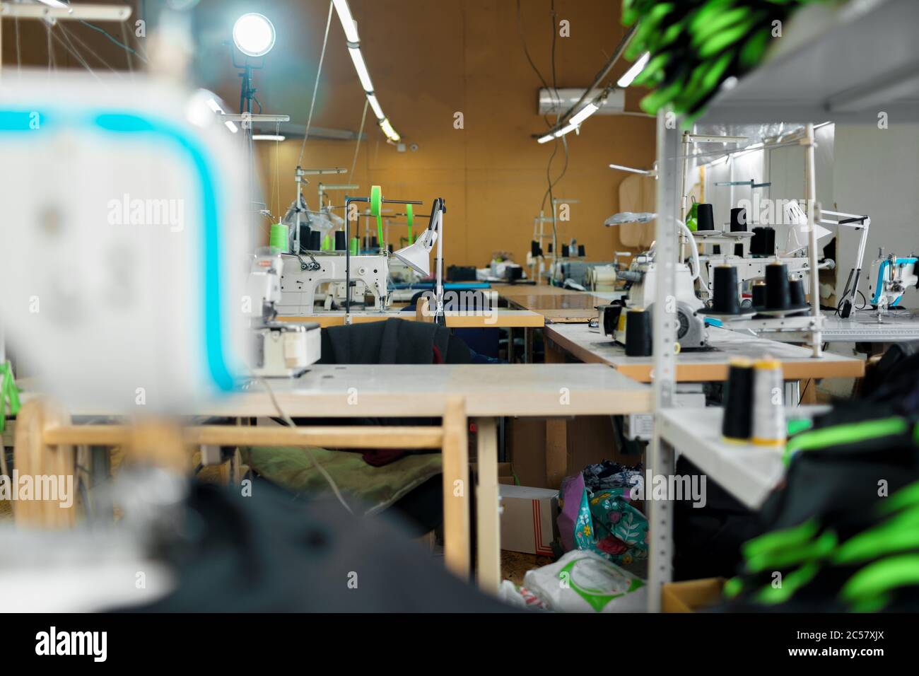 Sewing department of a textile factory interior Stock Photo - Alamy