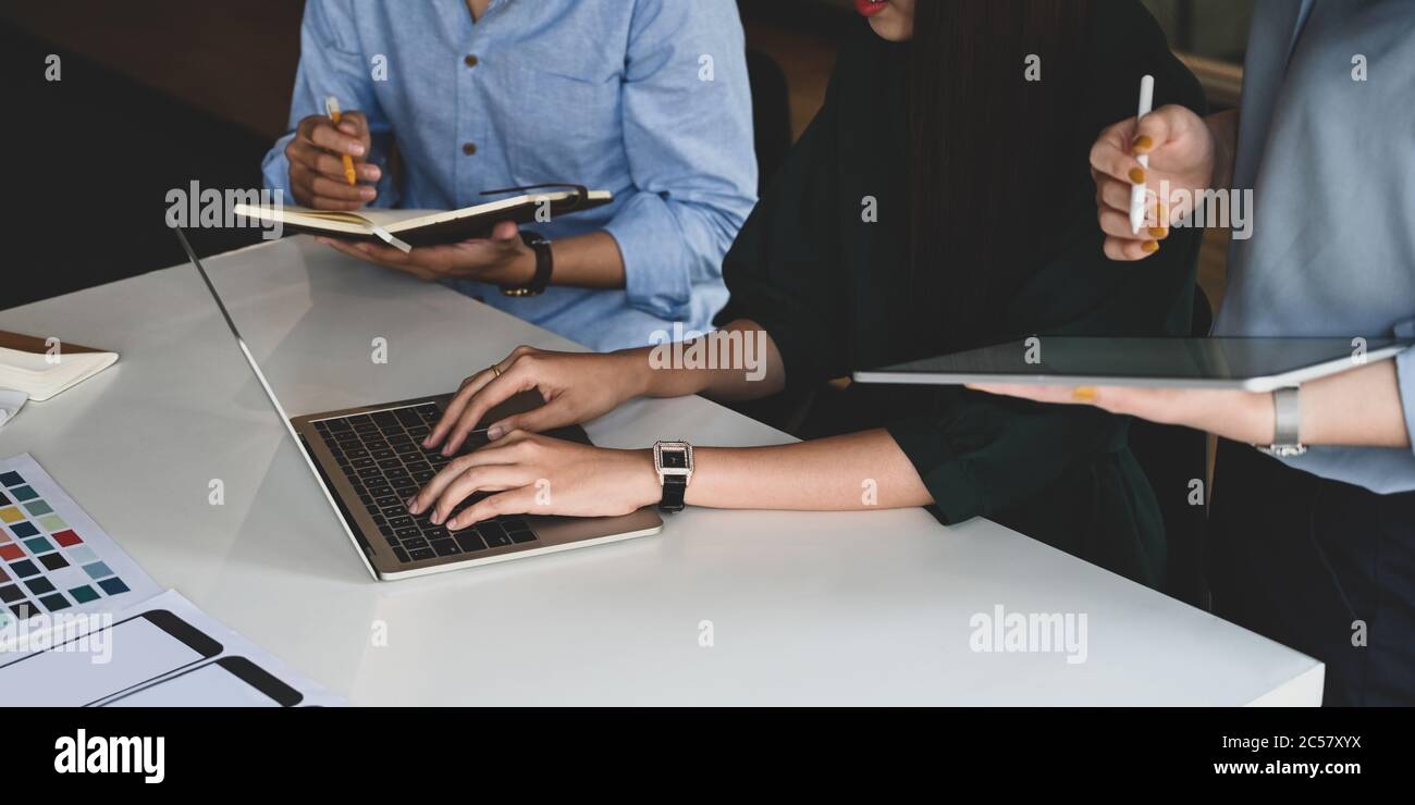 Top view image of graphic designing team working together and ...