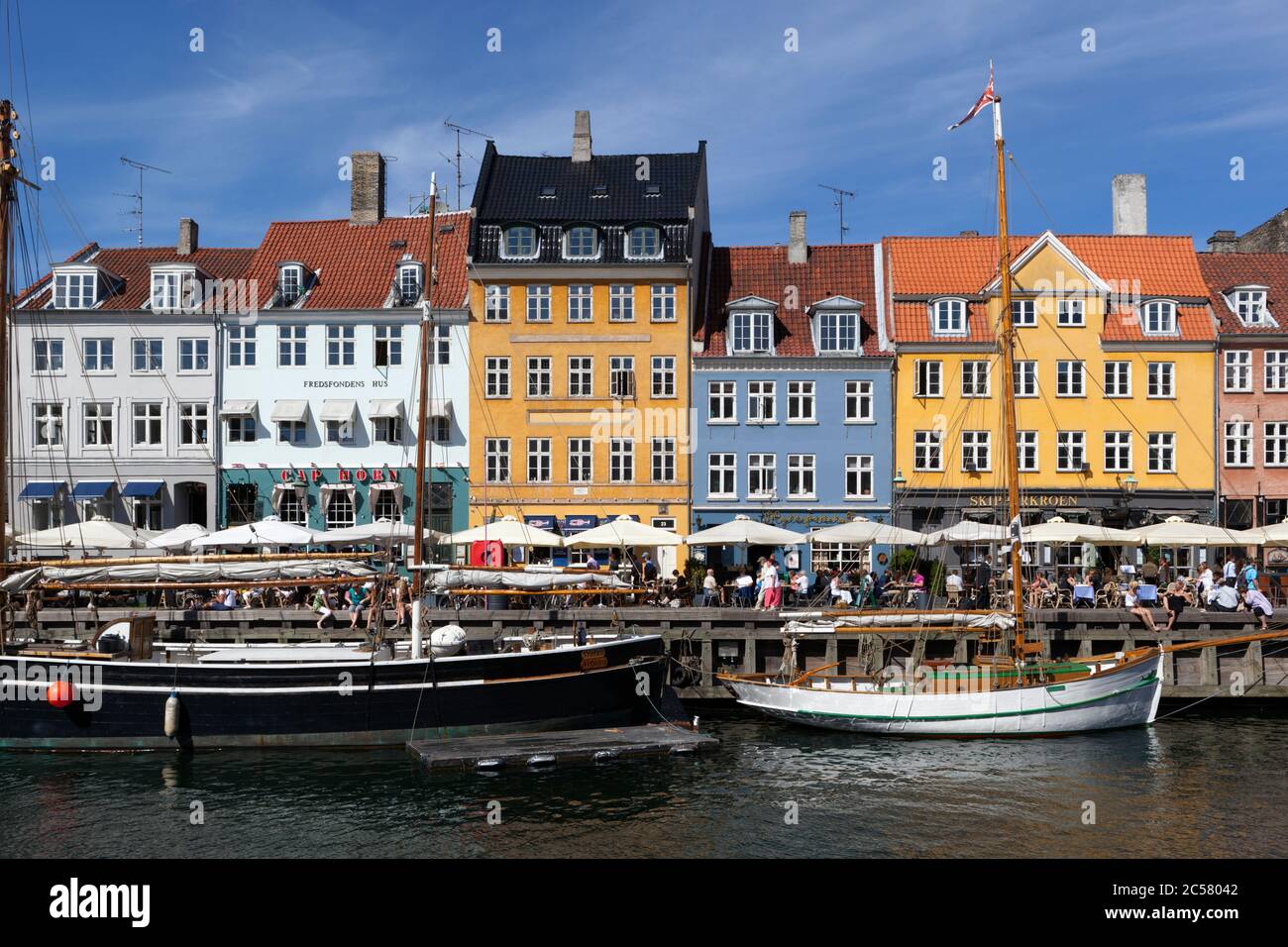 View over Nyhavn (New Harbour) canal lined with boats and former ...