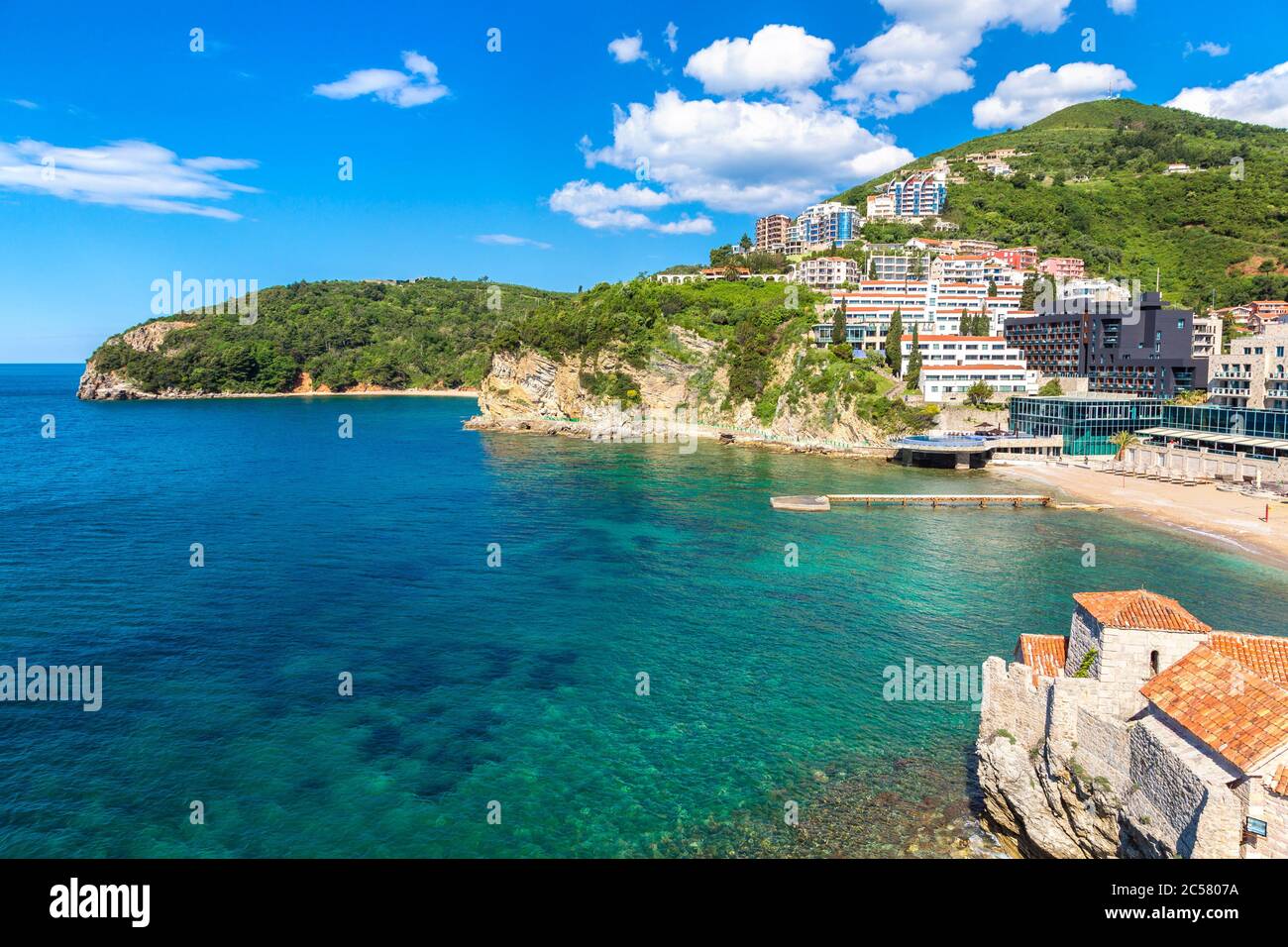 Mogren beach in Budva in a beautiful summer day, Montenegro Stock Photo ...