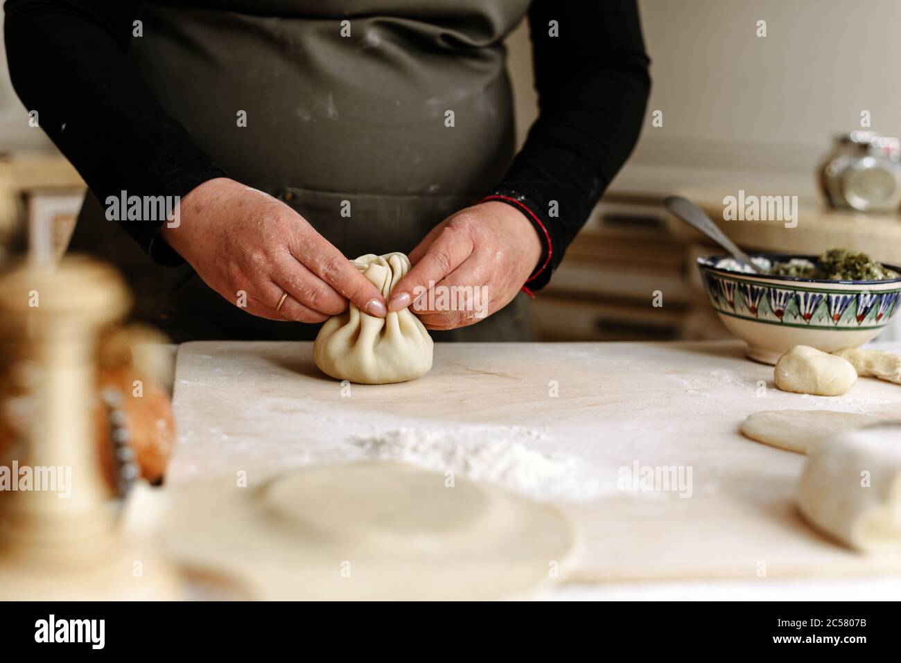 Woman making khinkali table hi-res stock photography and images - Alamy