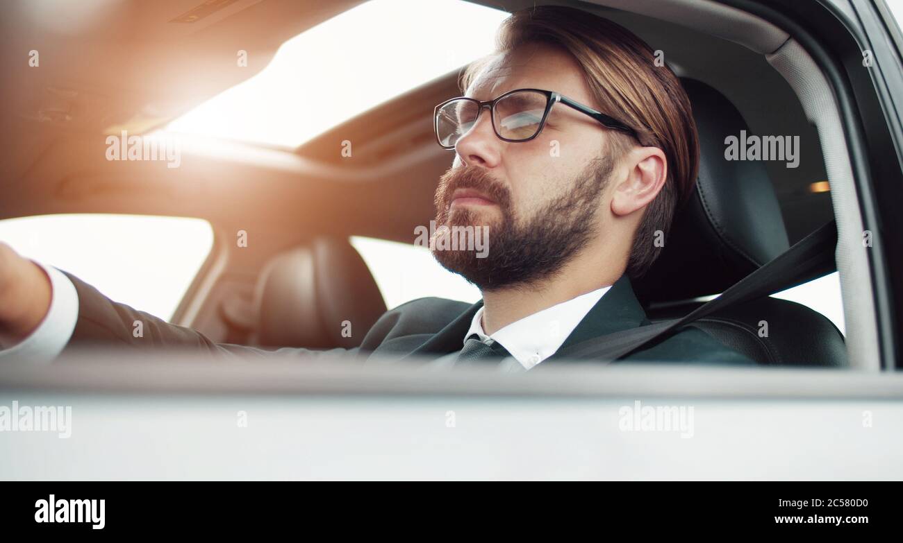 Man driving car portrait Stock Photo - Alamy