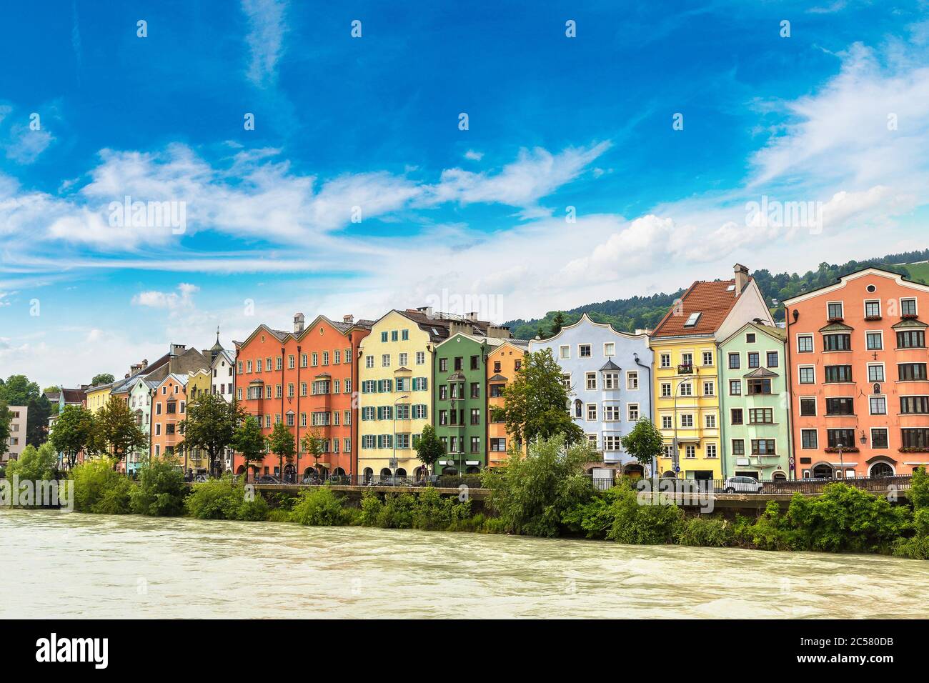 Building facade and Alps mountains behind in Innsbruck in a beautiful ...