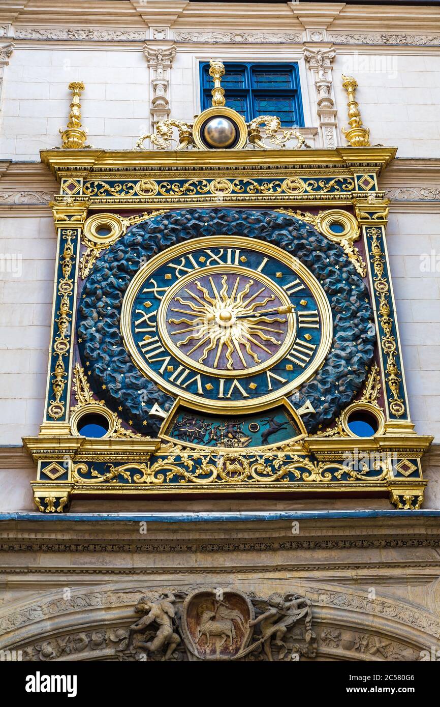 Clock in the Rue du Gros-Horloge in Rouen in a beautiful summer day ...
