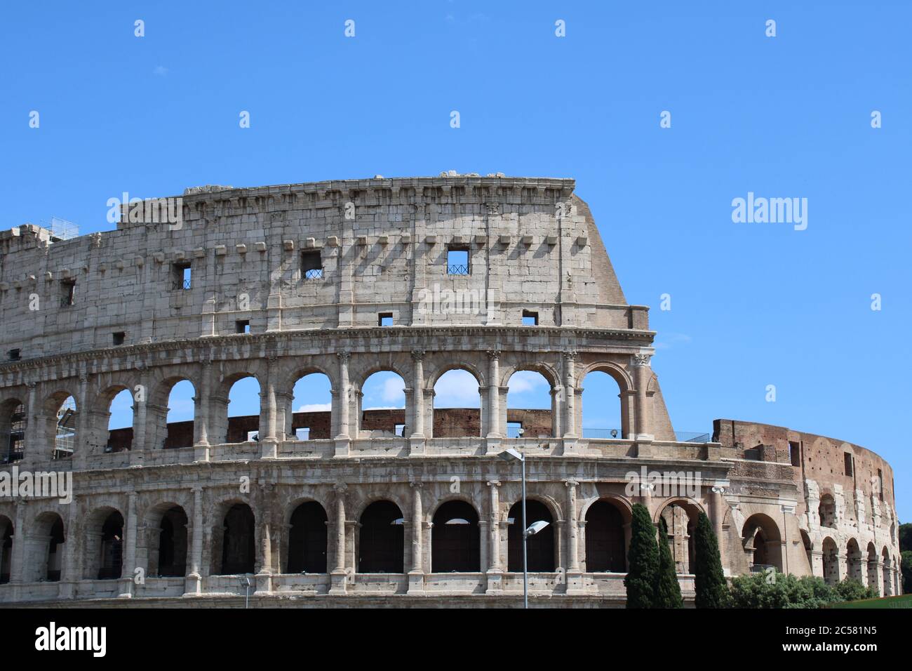 front view of famous Rome Colosseum a famous tourist destination and ...