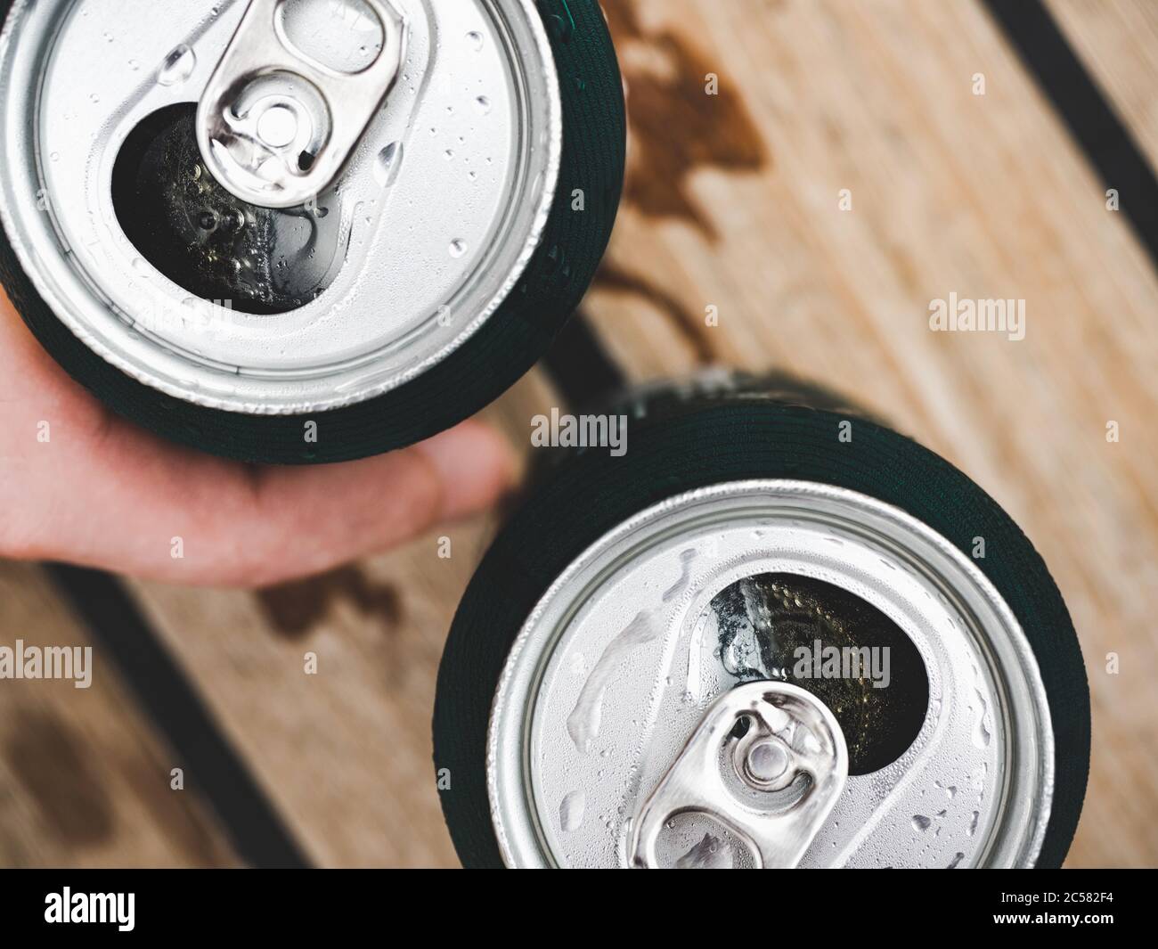 Closeup hands holding can hi-res stock photography and images - Alamy