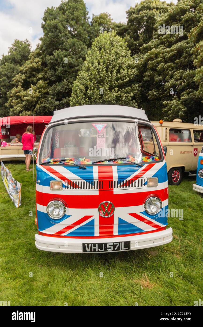 classic Volkswagen Kombi camper van with Union Jack flag painted along ...