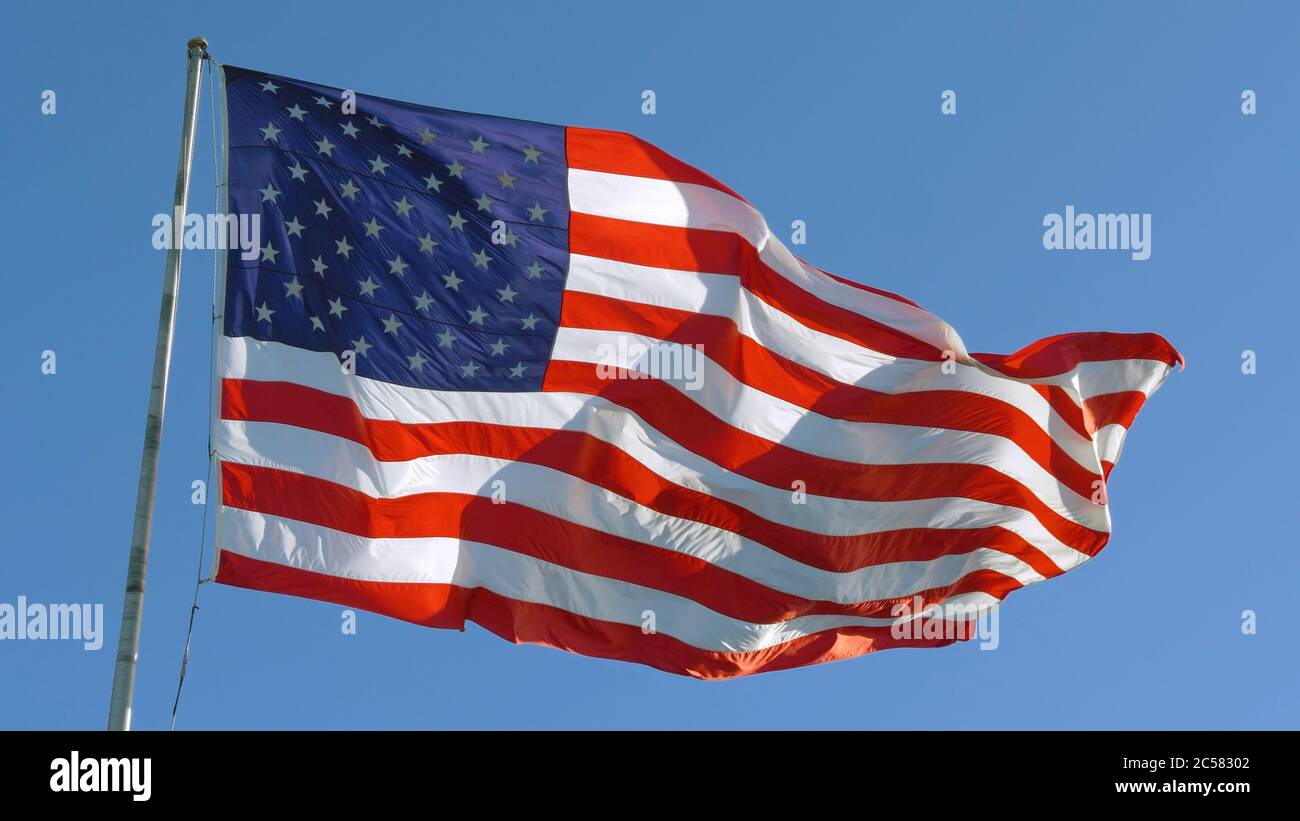 American usa flag on flagpole hi-res stock photography and images - Alamy