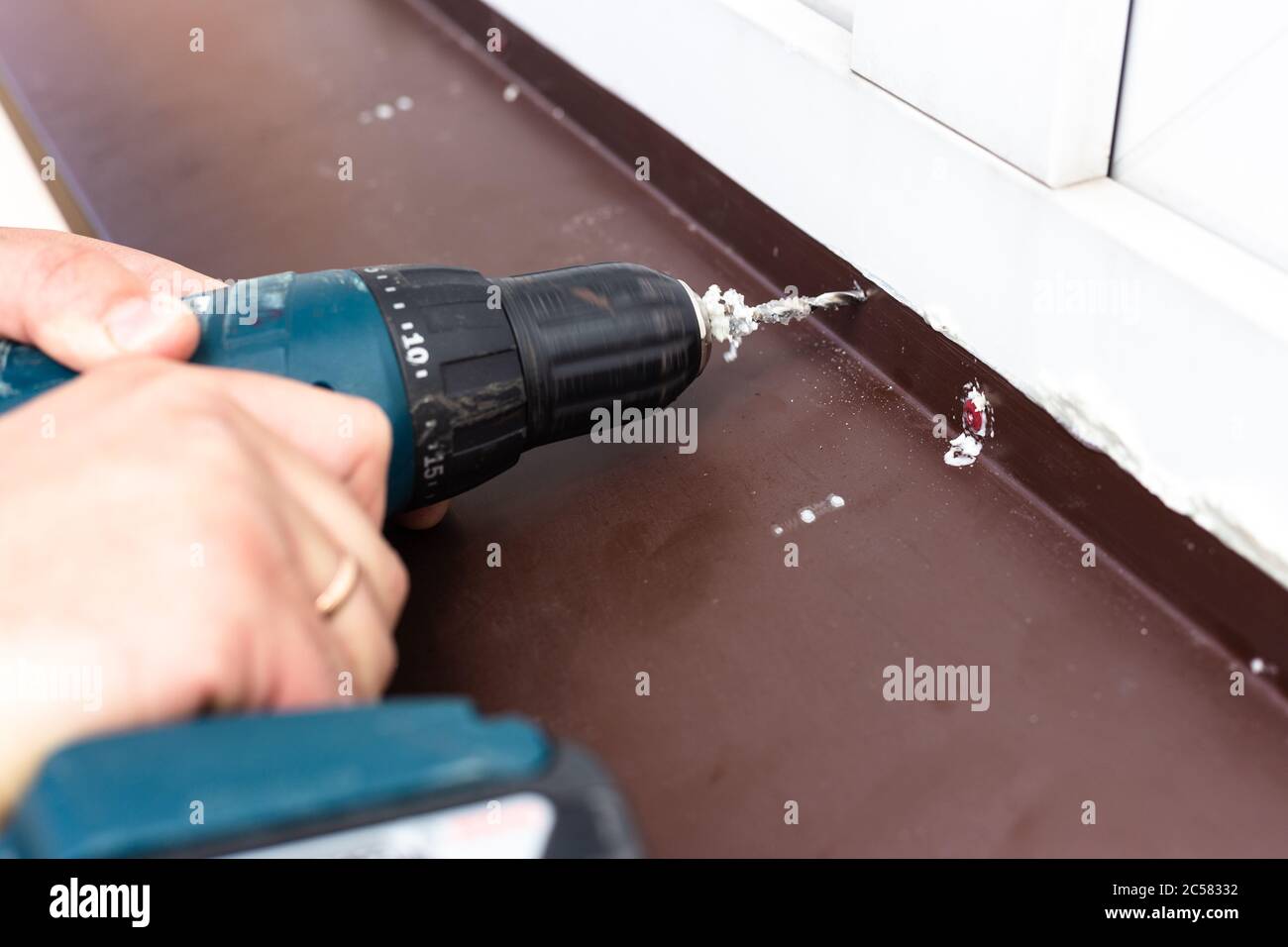 Construction work - drilling holes Stock Photo - Alamy