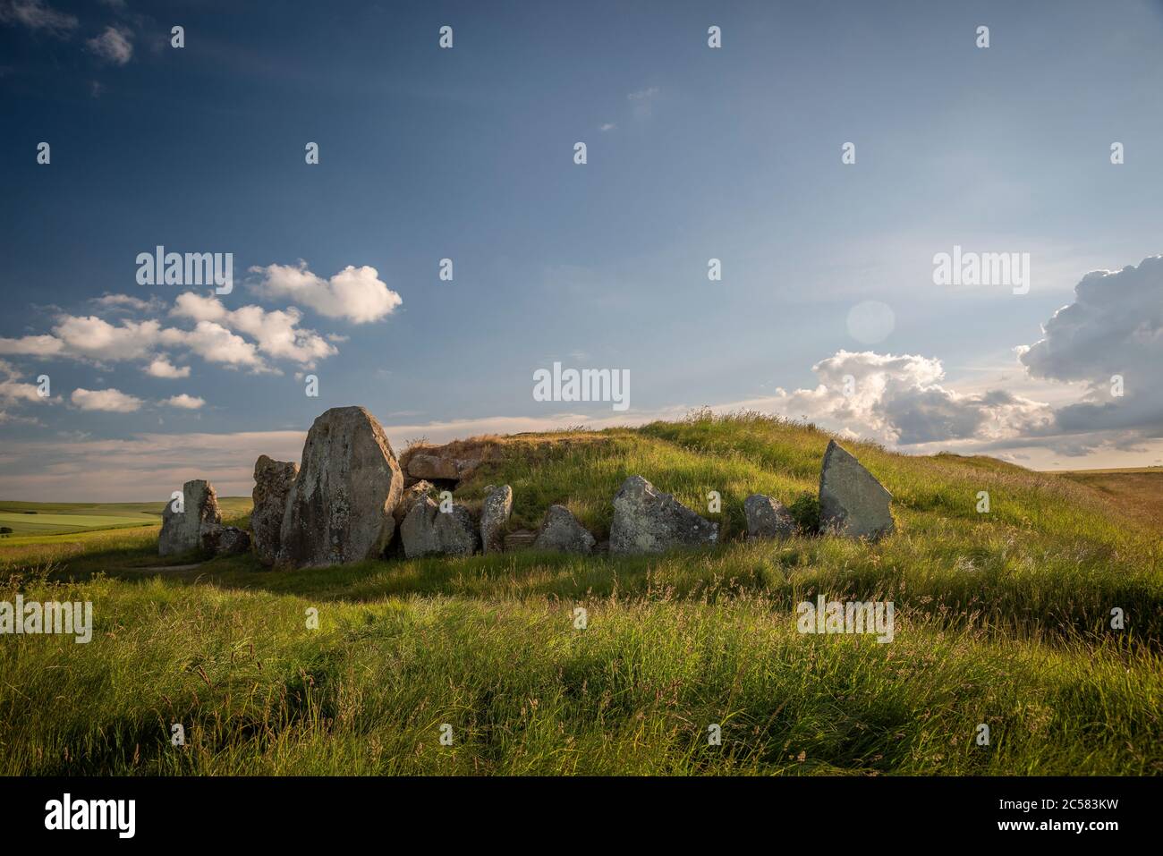 The earth mound and stone facade of West Kennet Long Barrow Neolithic ...