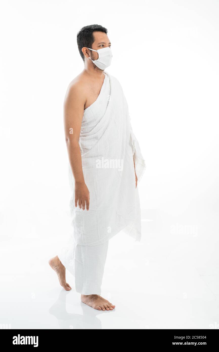 portrait of asian male umrah. muslim hajj wearing white ihram isolated ...