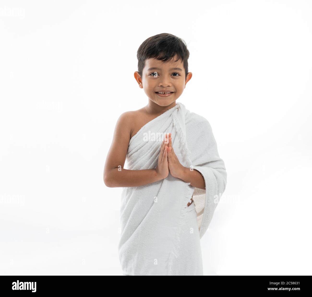 kid boy greeting smiling to camera isolated over white background Stock ...