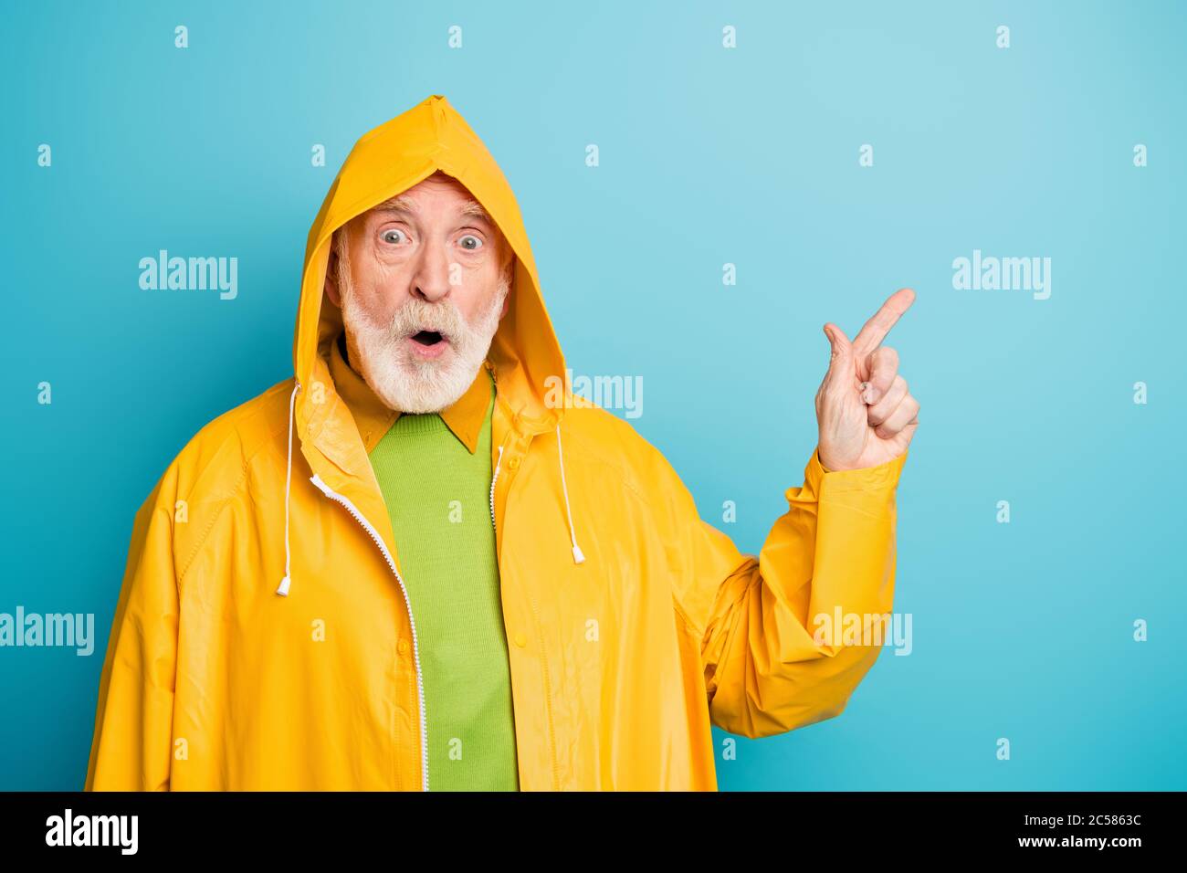 Old man wearing blue coat hi-res stock photography and images - Alamy
