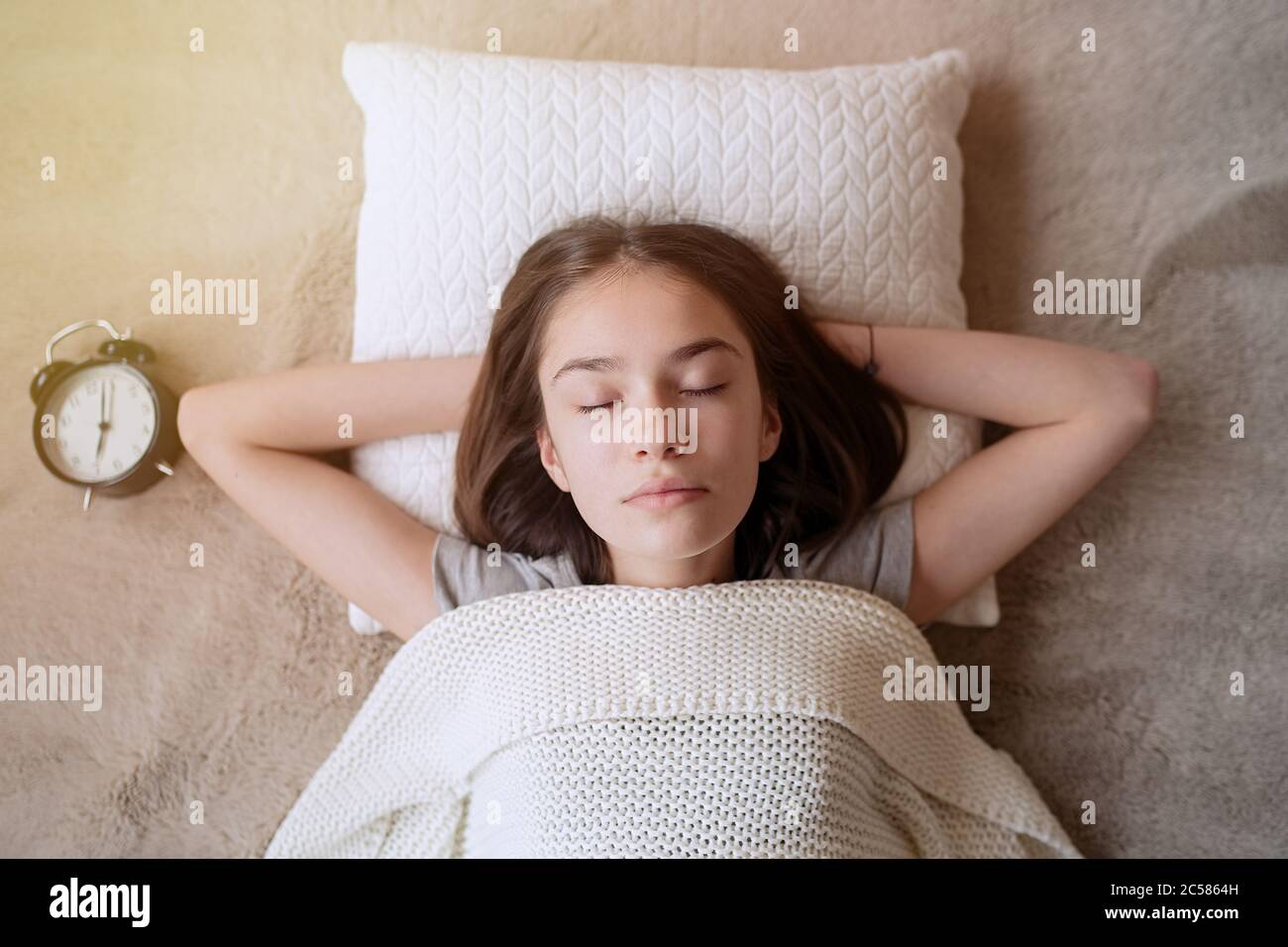 Cute teenager girl sleeping on white pillow at home Stock Photo - Alamy