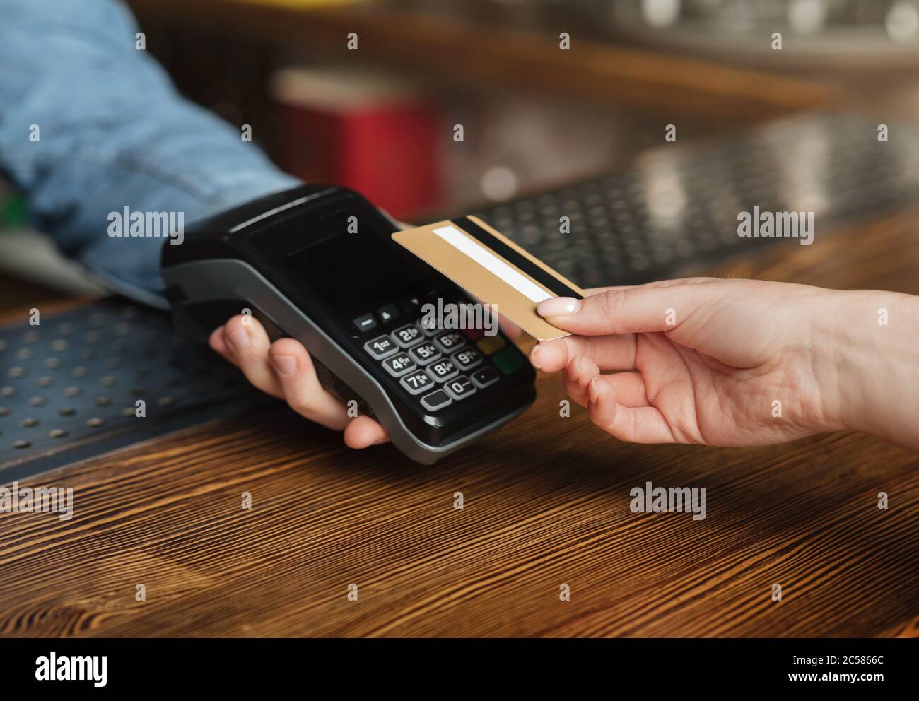 Quick and easy pay bill. Customer pays for drinks with credit card at ...