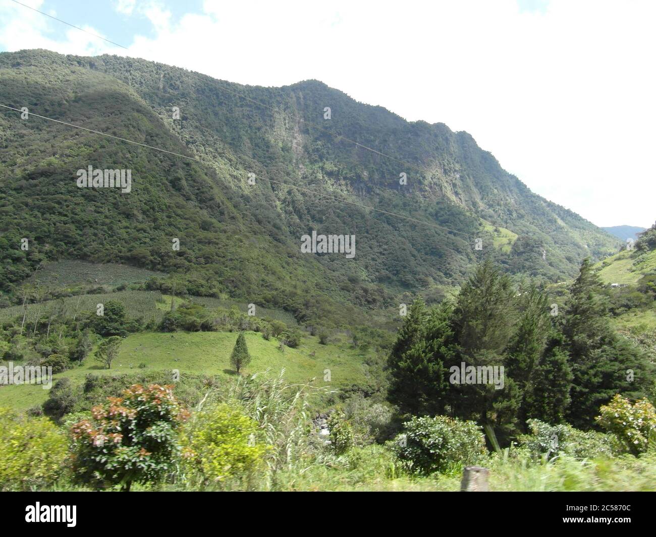 Stunning mountains in Banos and the famous "tree House". Casa de Arbol ...