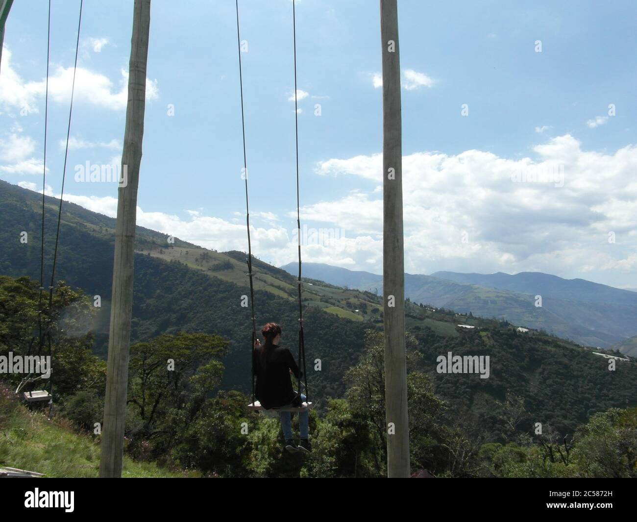 Stunning mountains in Banos and the famous "tree House". Casa de Arbol ...