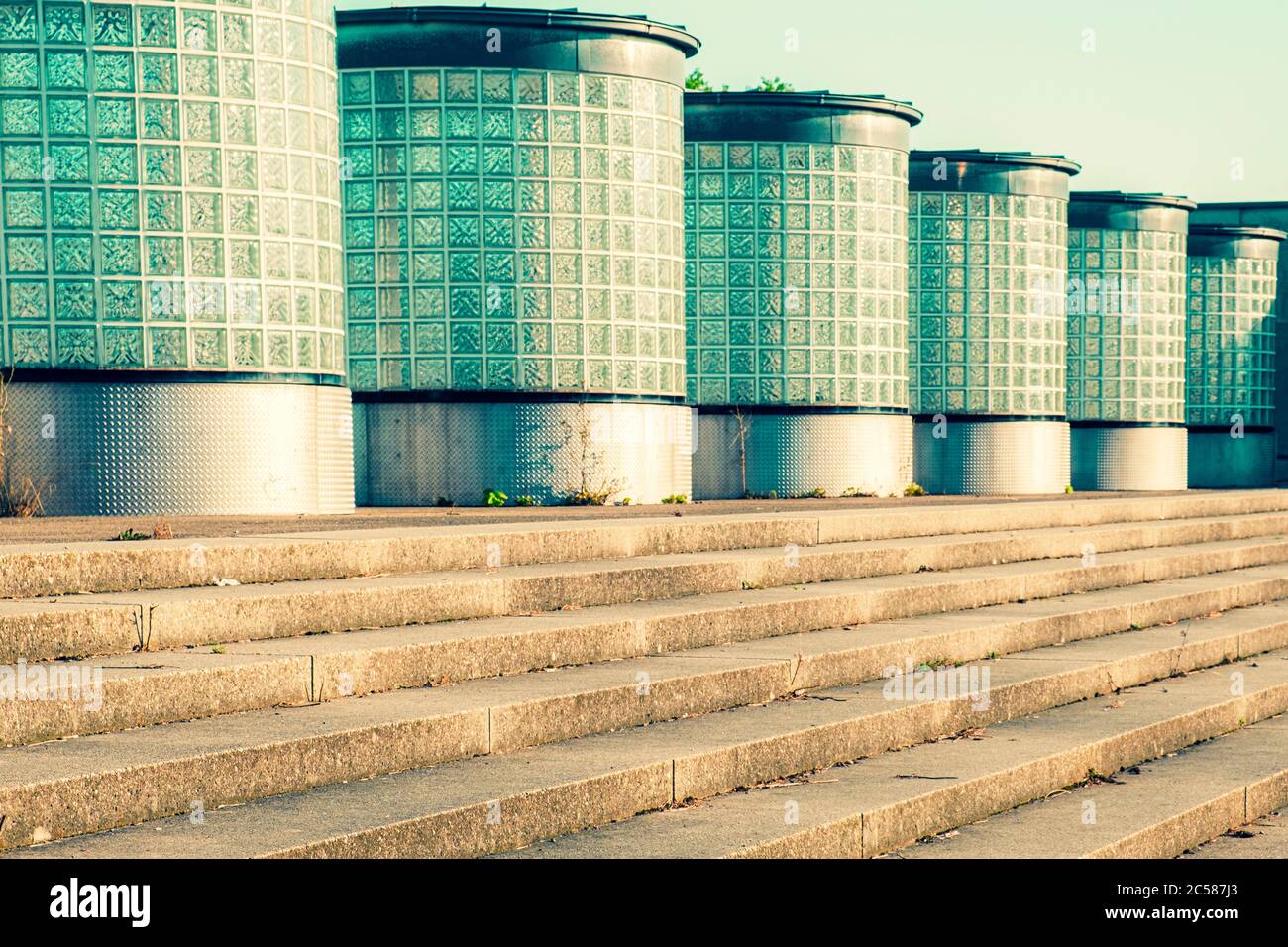 Glass brick columns above stairs Stock Photo - Alamy