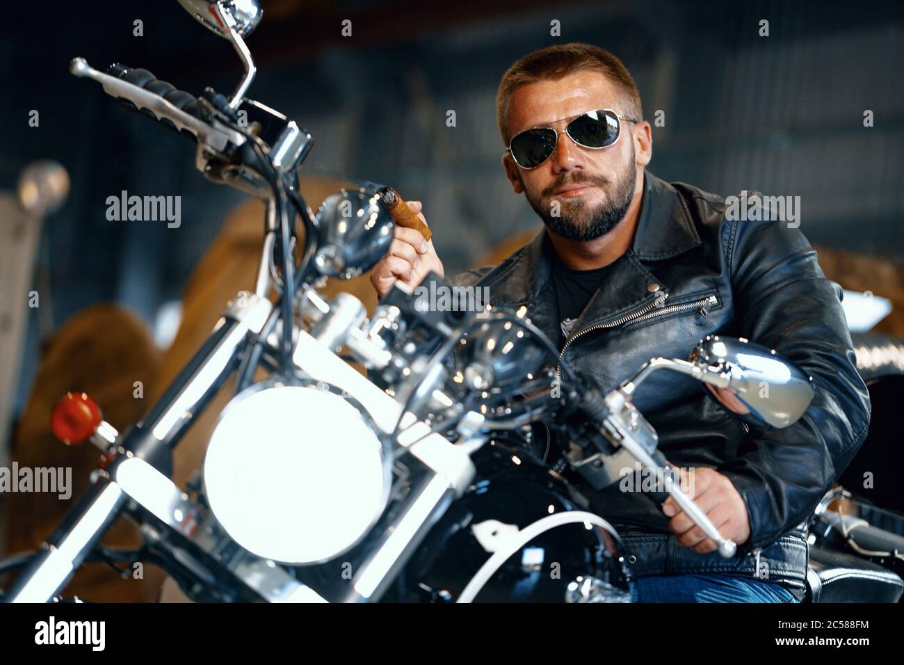 Biker smoking cigar hi-res stock photography and images - Alamy