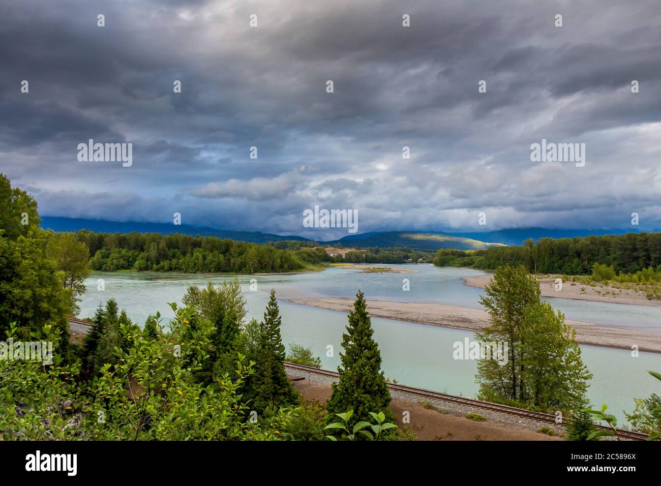 Looking upstream on the Skeena River towards Terrace, beside the CN ...
