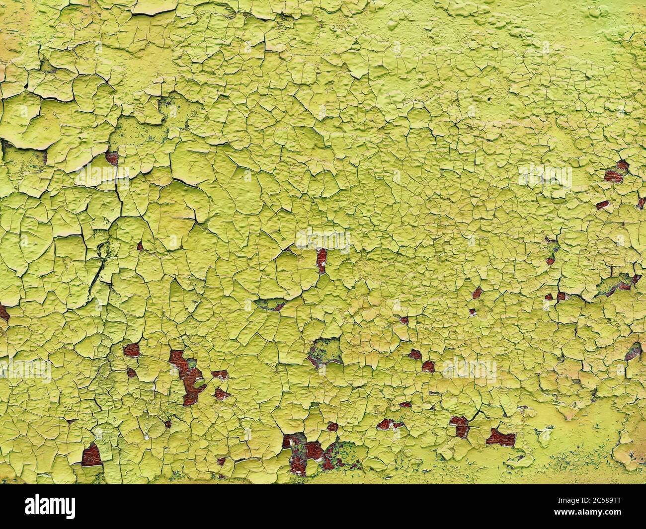 Rusty metal panel with cracked yellow paint, corroded grunge metal ...