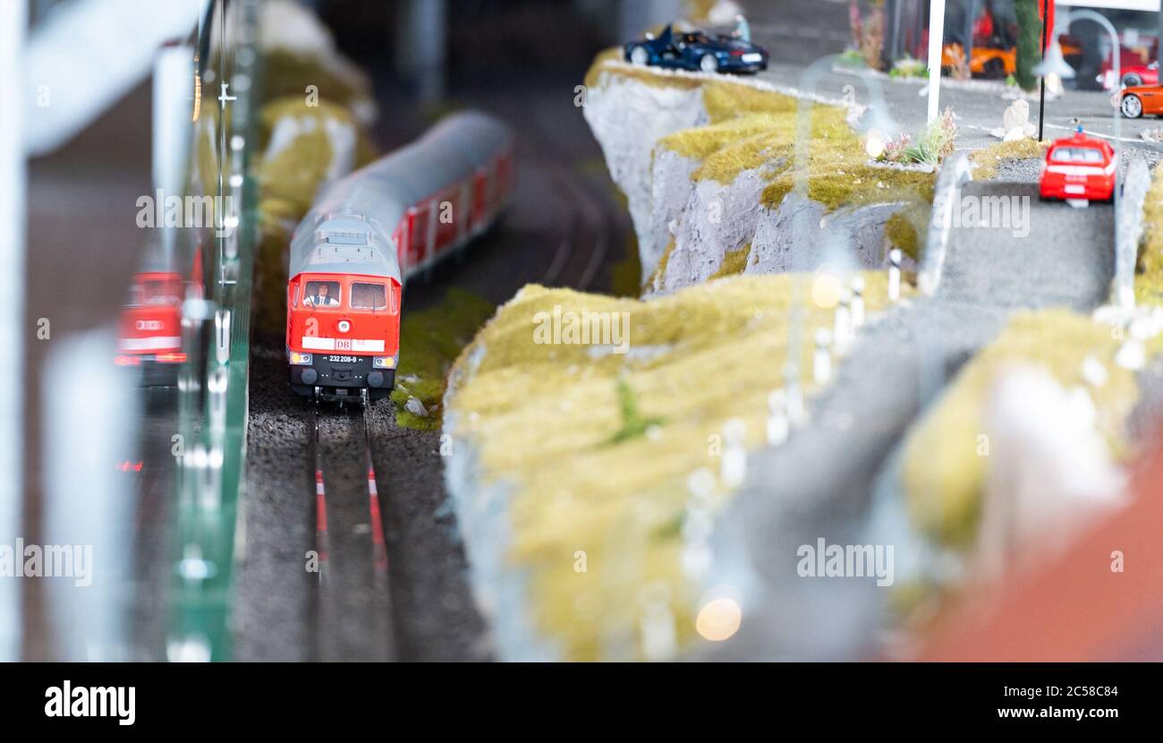 Bispingen, Germany. 01st July, 2020. A train runs over the model ...