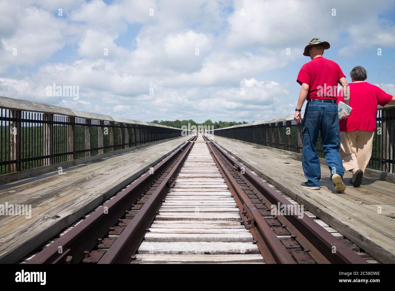 People stroll along pathway hi-res stock photography and images - Alamy