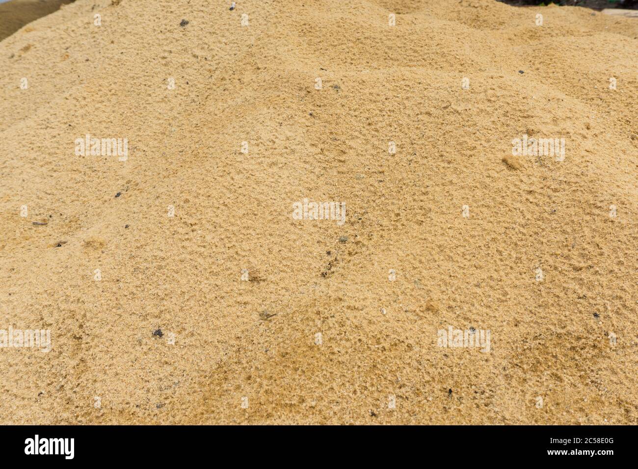 Close up sand background. Sunny sand texture Stock Photo - Alamy