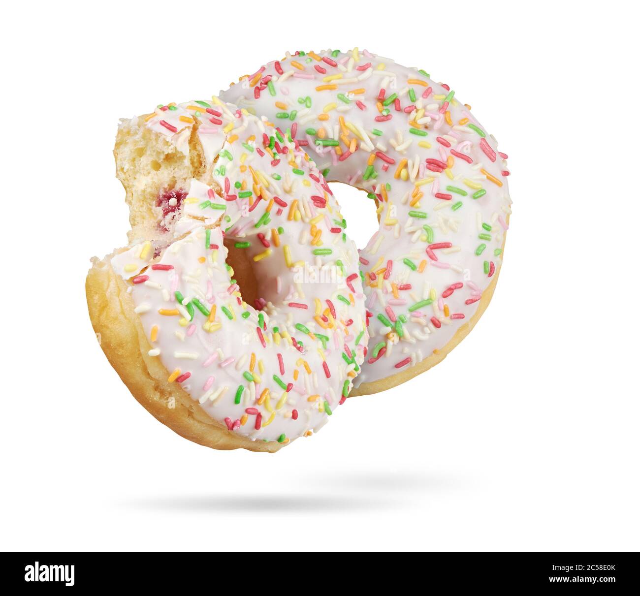 glazed round donuts with sprinkles isolated on white background. Top ...