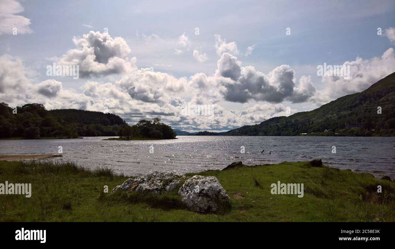 Small island in a lake Stock Photo - Alamy