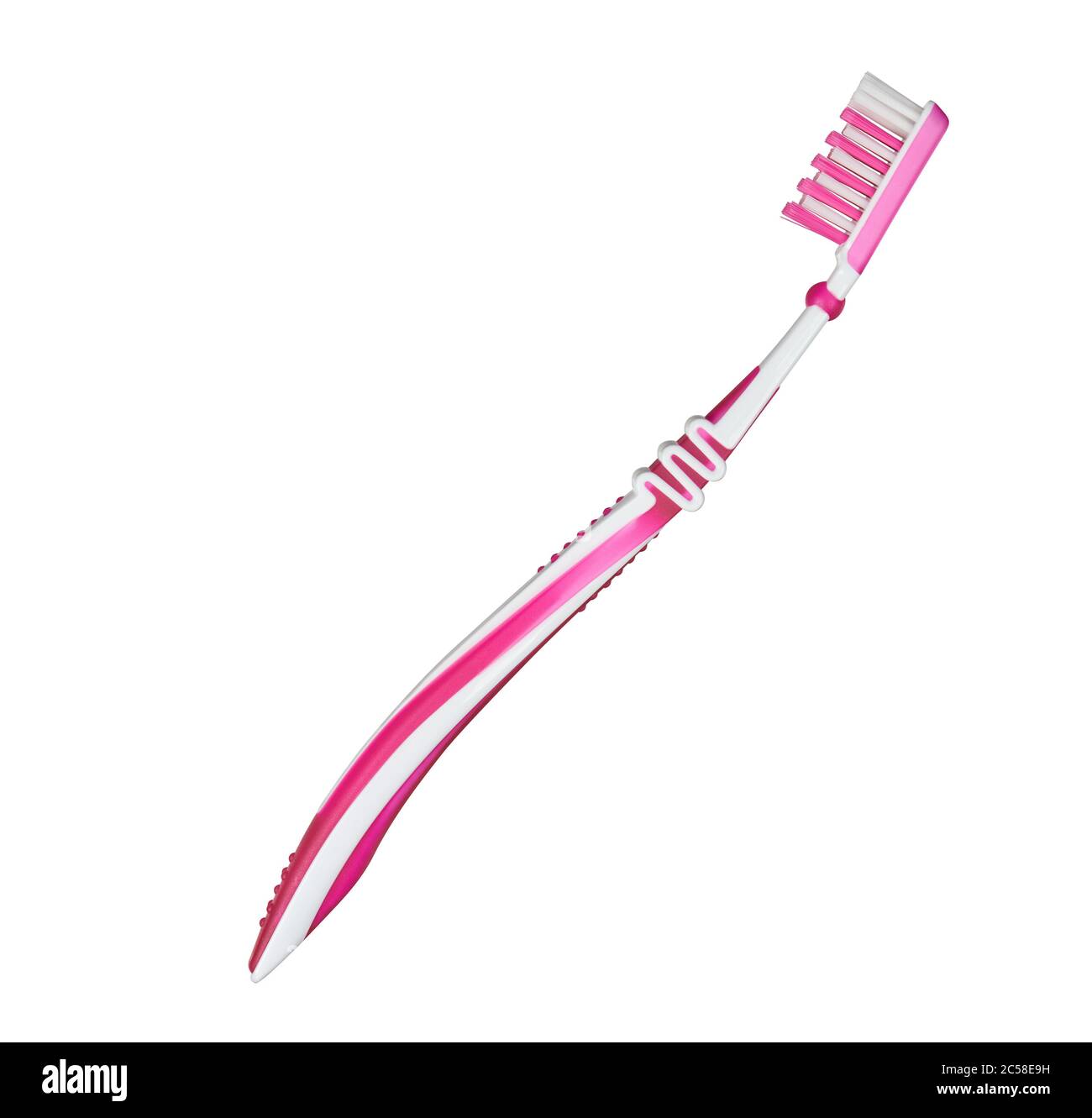 pink plastic toothbrush sideways isolated on white with clipping path ...