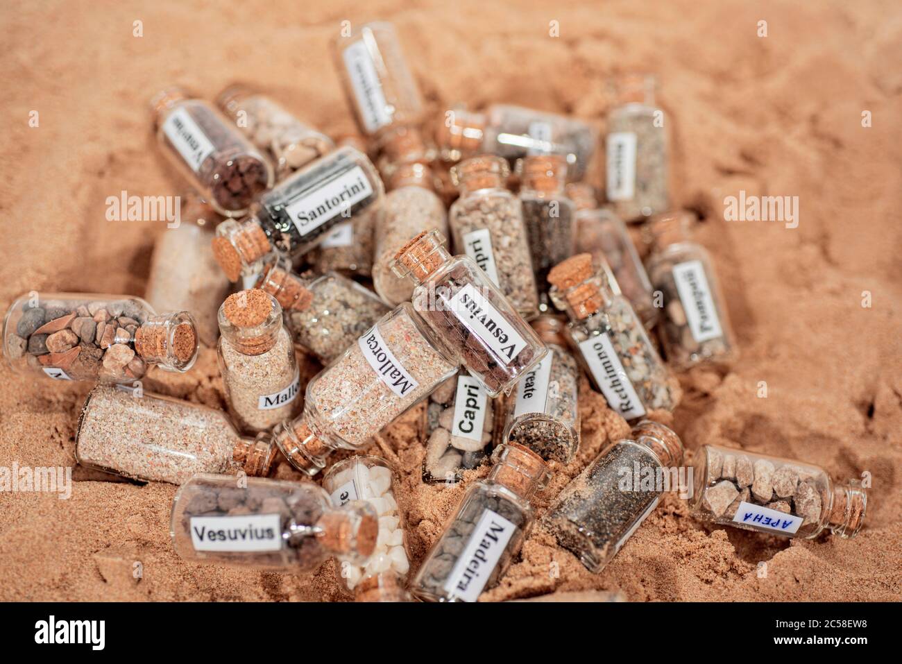 Glass test-tube with sand of different summer vacation countries Stock ...