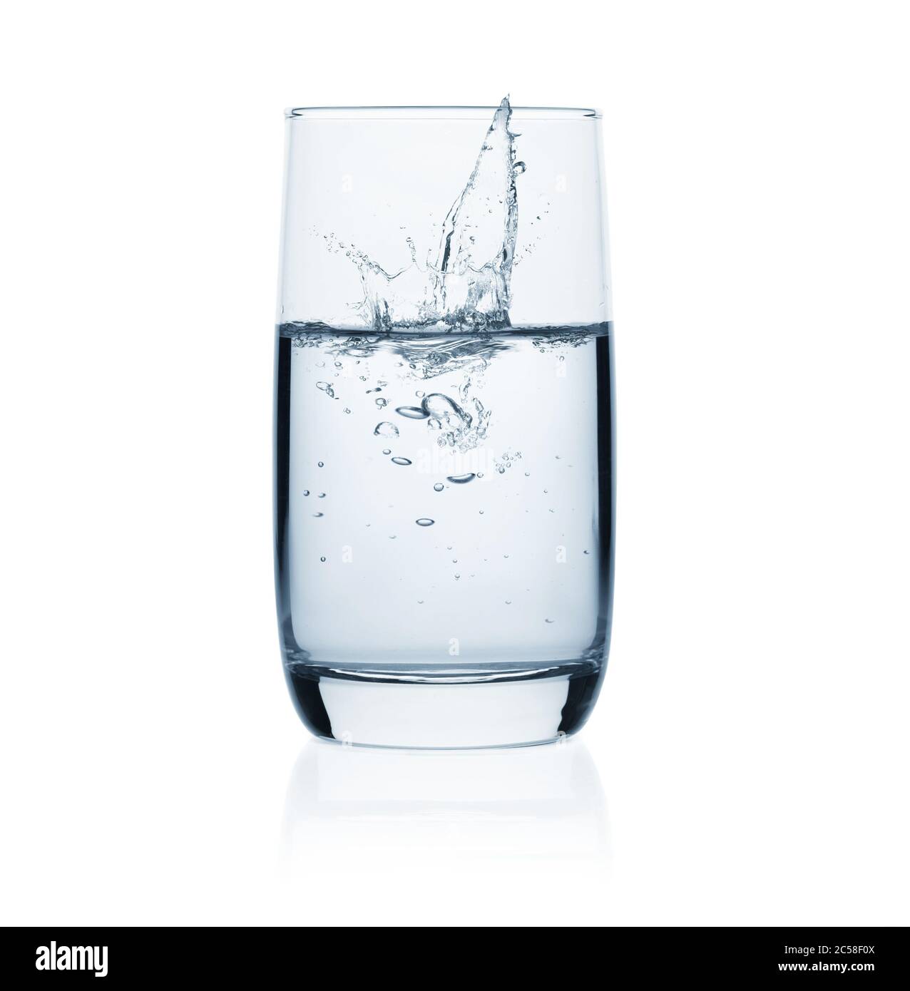 purified fresh drink water from the bottle in a glass. Isolated Stock ...