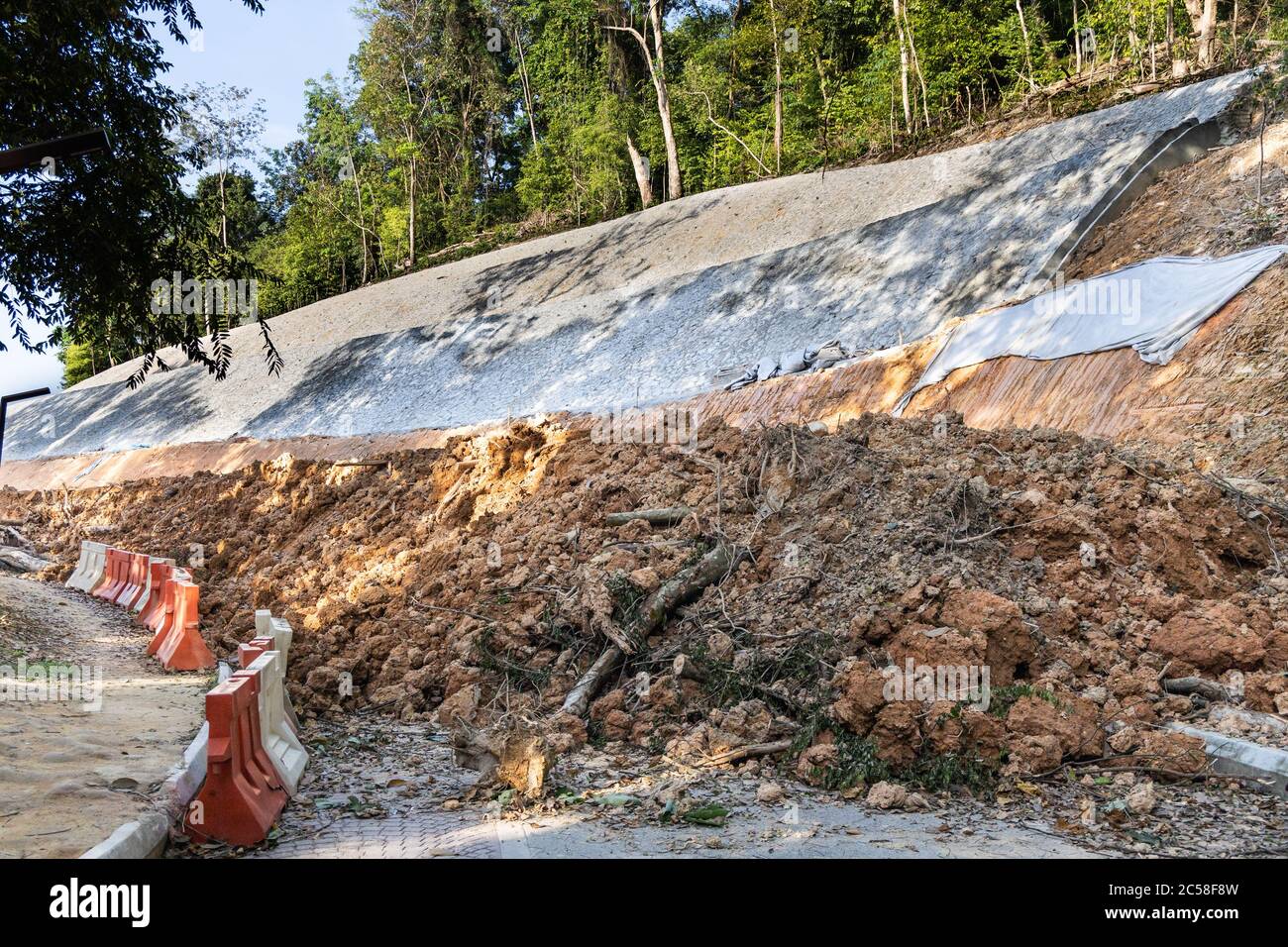 Slope retention construction work being carried out to manage landslide ...