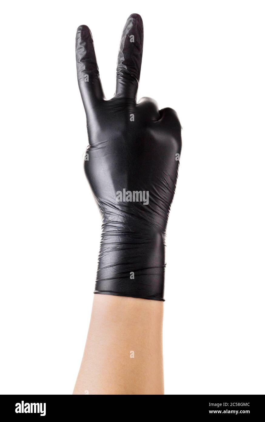 Hand in black gloves showing two fingers up in peace or victory symbol ...