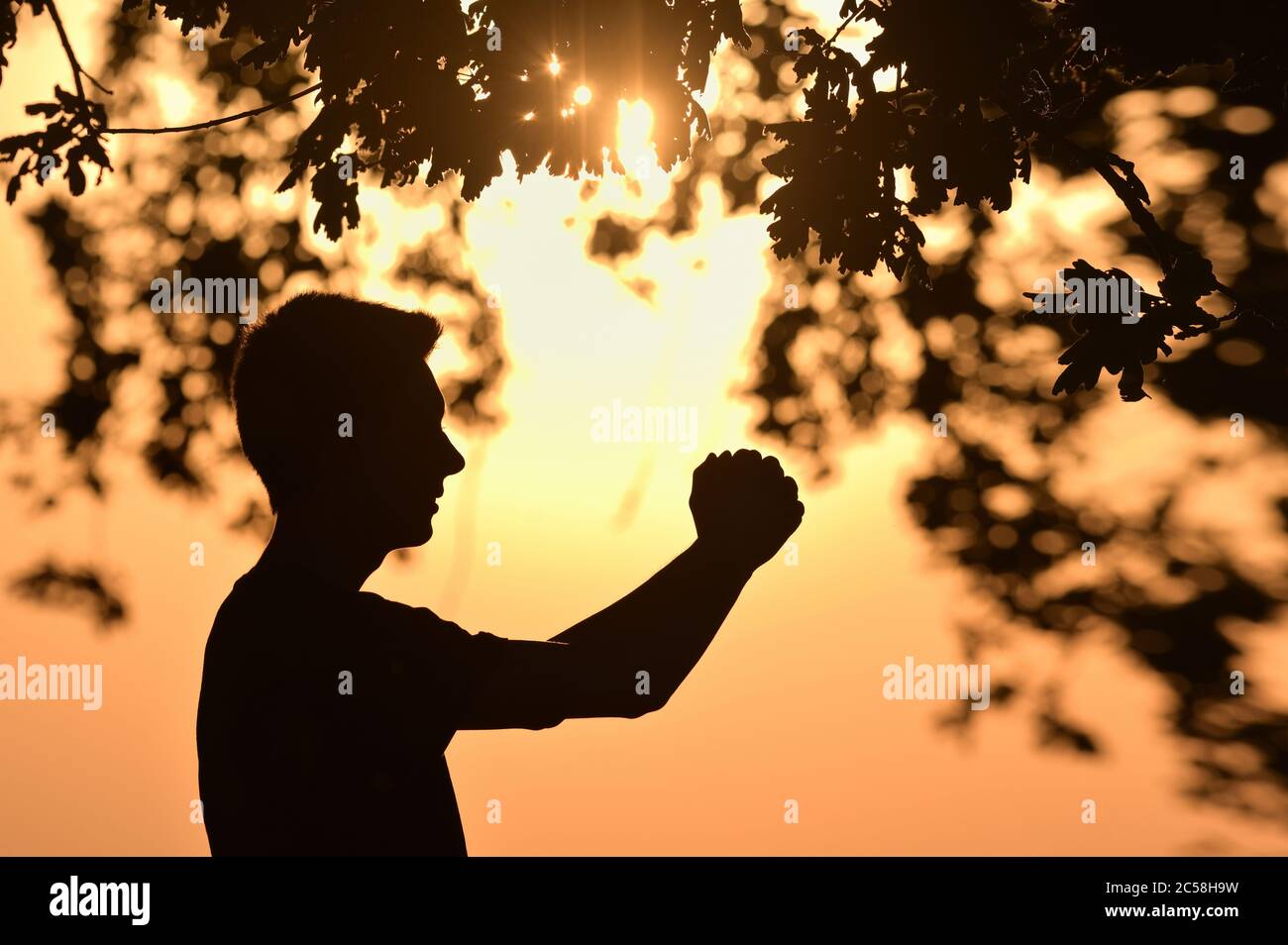 Young Sad Man Praying High Resolution Stock Photography and Images - Alamy