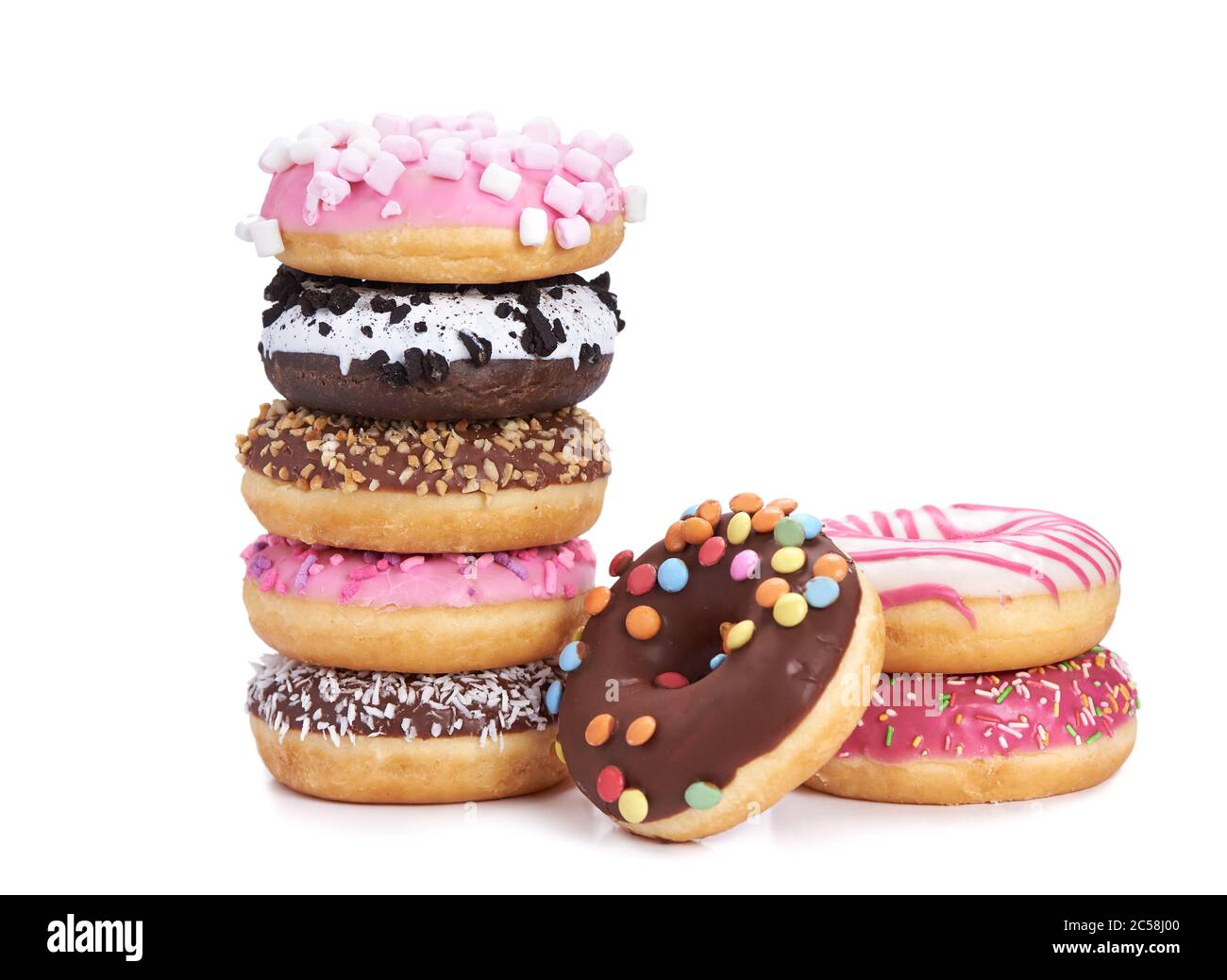 Stack of glazed doughnut with sprinkles on white background. Copy space ...
