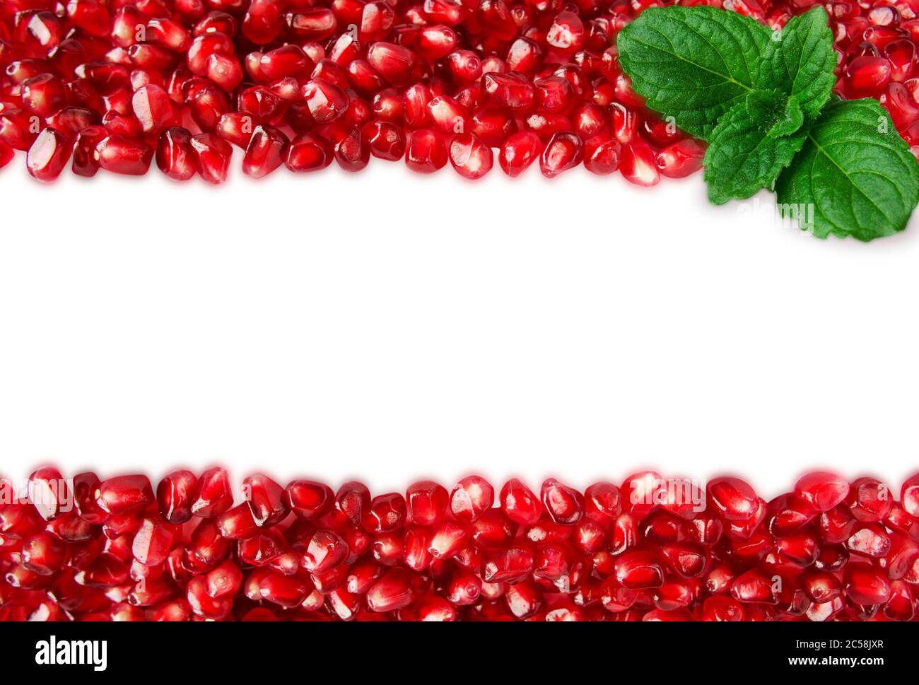 Background made of red pomegranate seeds. The scattered red grains of a ...
