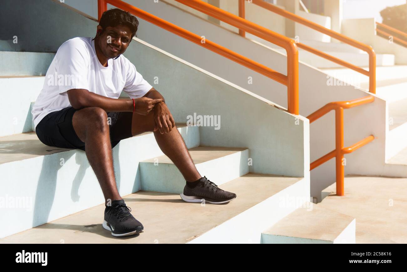Young man sitting before monitor hi-res stock photography and images ...