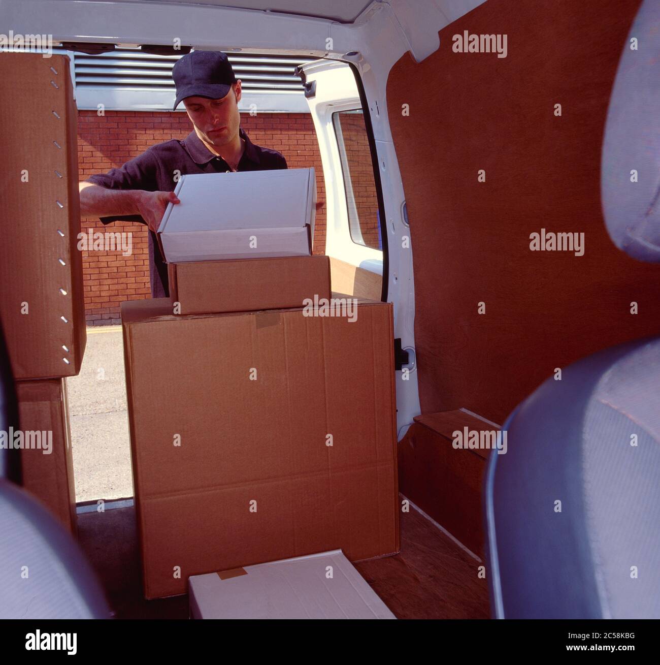 Checking packages hi-res stock photography and images - Alamy