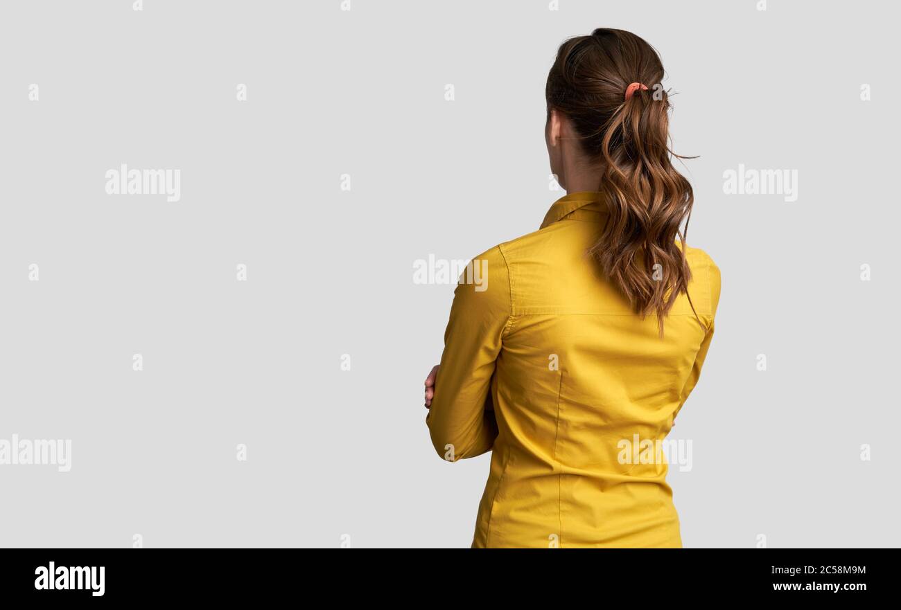 Woman isolated back looking away hi-res stock photography and images ...