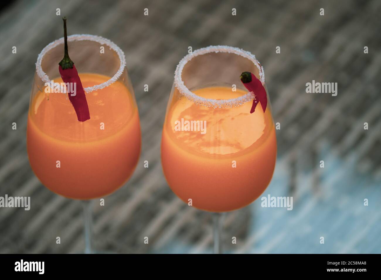 Glass of mango chilli martini or cocktail Stock Photo - Alamy