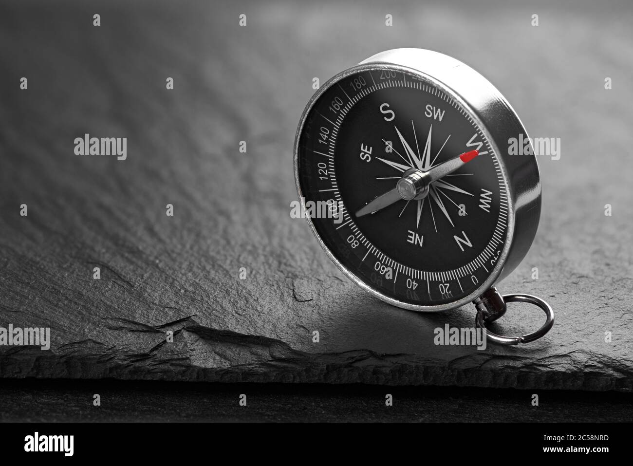 navigational compass on a stone background Stock Photo - Alamy