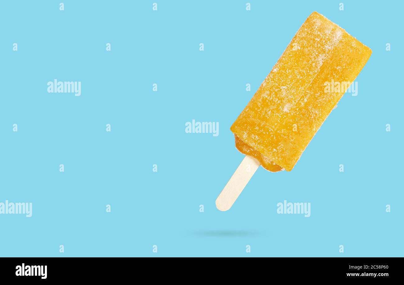 Yellow mango fruit popsicle ice cream stick isolated on the white ...