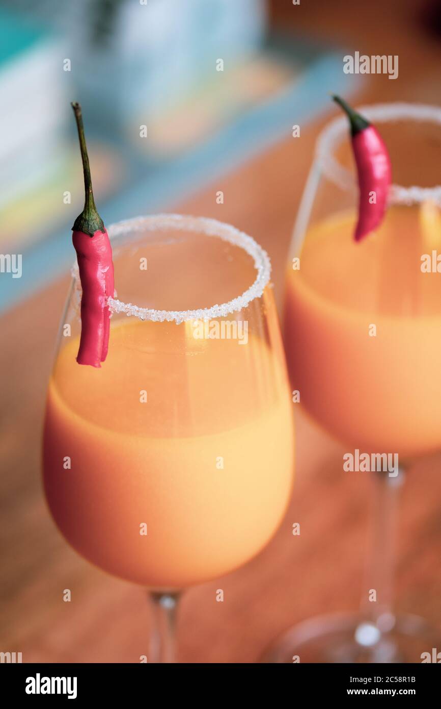 Glass of mango chilli martini or cocktail Stock Photo - Alamy